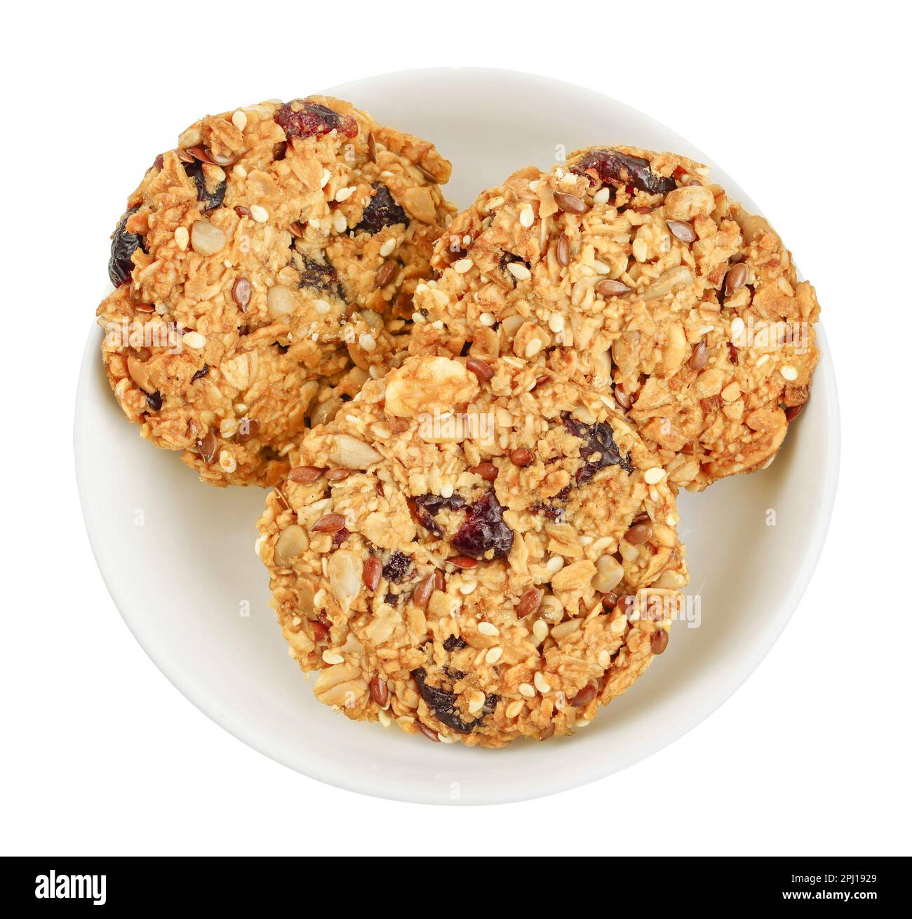 Granola cookie in ceramic bowl isolated on white background with full ...
