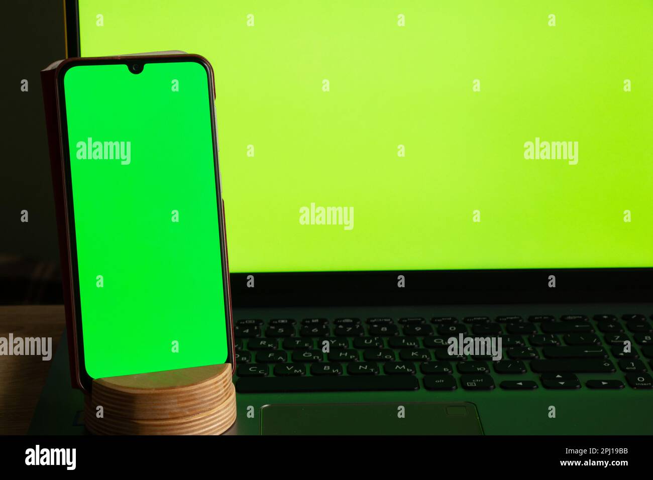 Laptop display green screen background hi-res stock photography and ...