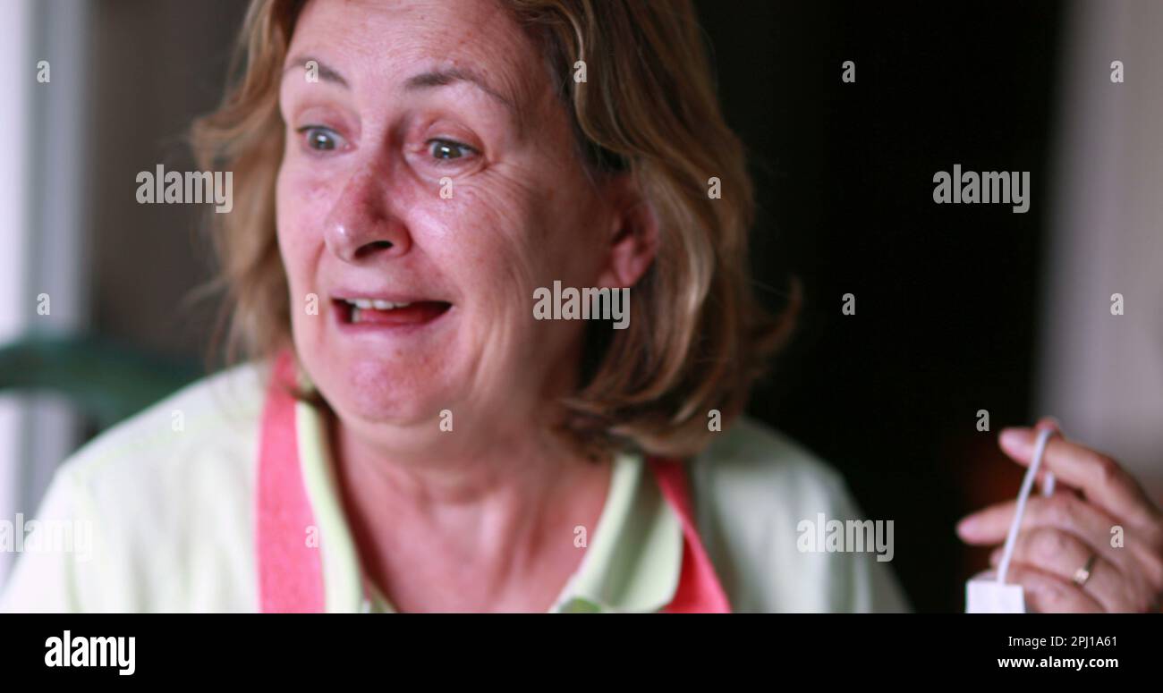 Older woman shock reaction with mood swings. Portrait of senior lady ...