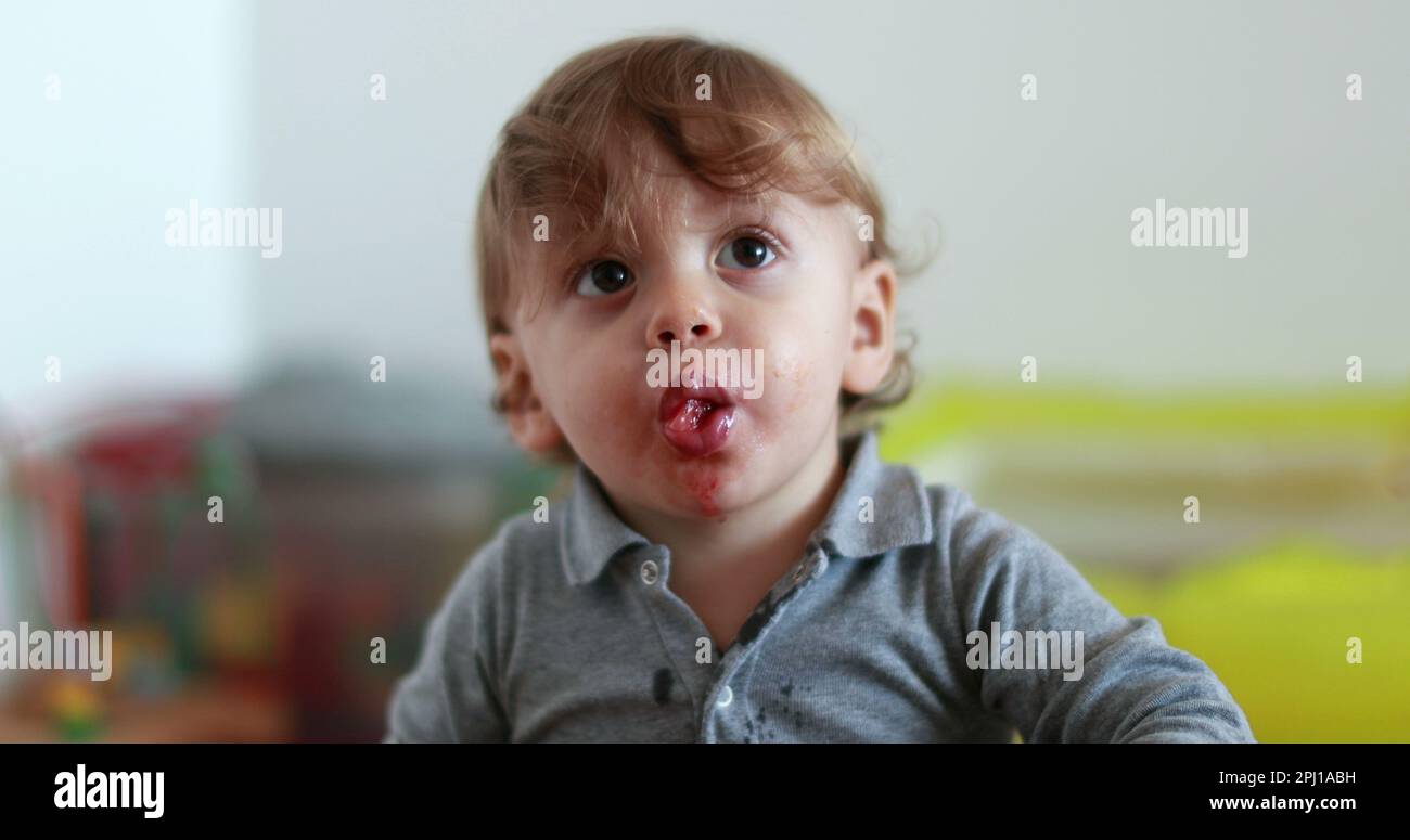 Infant toddler chewing food hi-res stock photography and images - Alamy