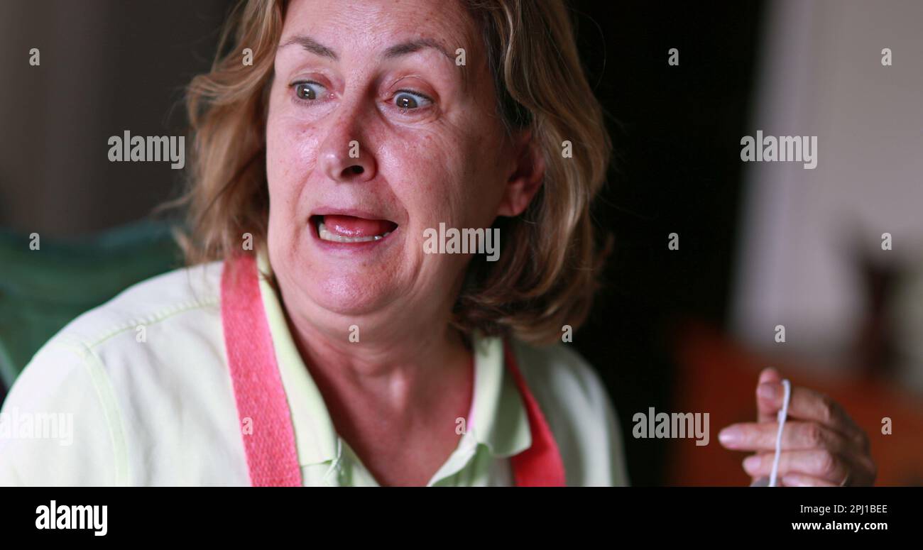 Older woman shock reaction with mood swings. Portrait of senior lady ...