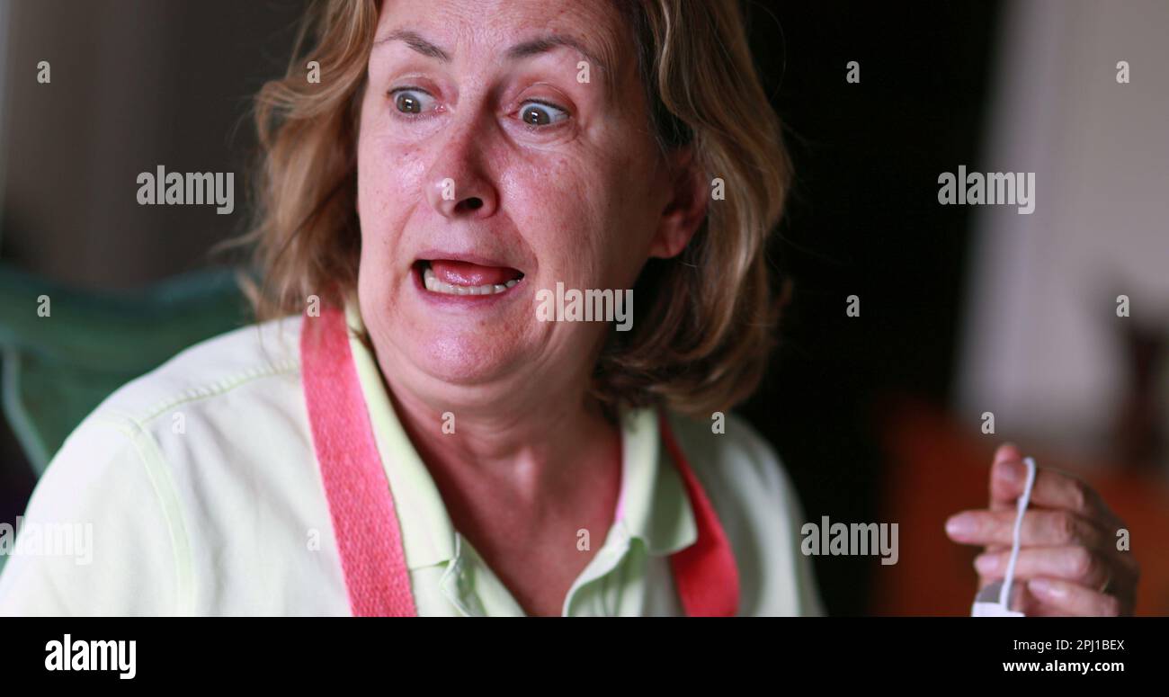 Older woman shock reaction with mood swings. Portrait of senior lady ...