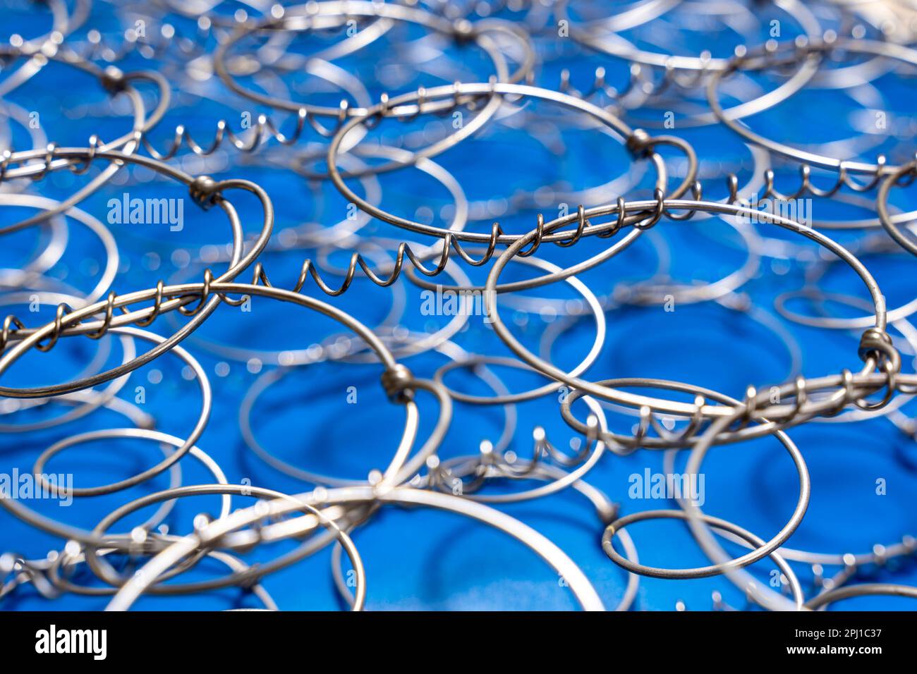 Abstract background The internal structure of a spring mattress Stock ...