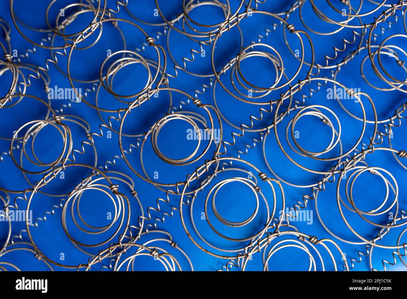 Abstract background The internal structure of a spring mattress Stock ...
