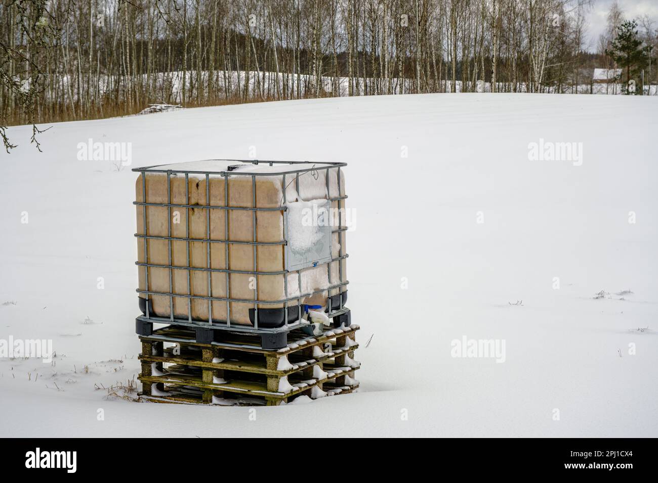 Plastic water tank. Water tank in the form of a container. Water tank ...