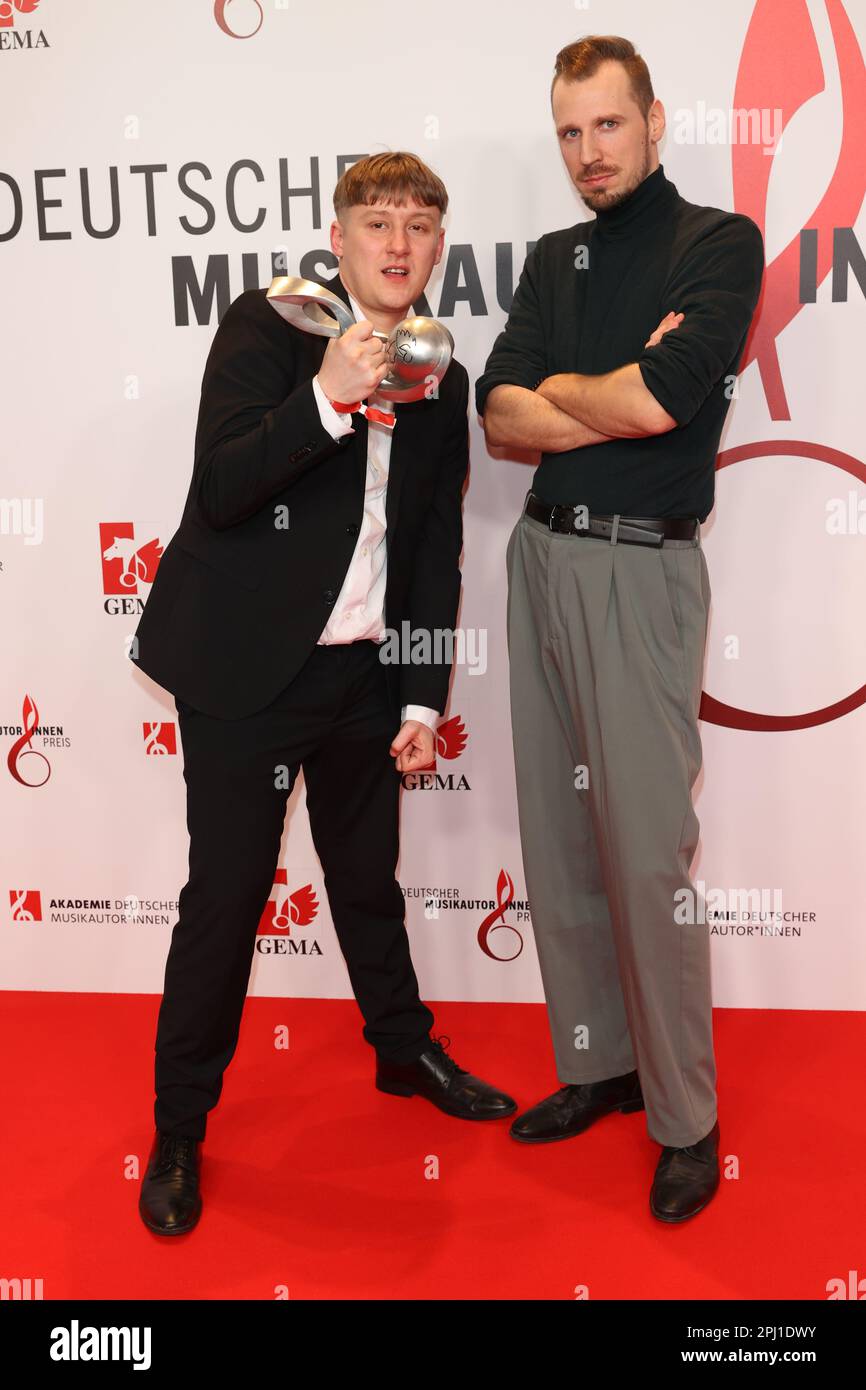 Berlin, Germany. 30th Mar, 2023. Jacob Jüngst (l, JACE) receives the ...