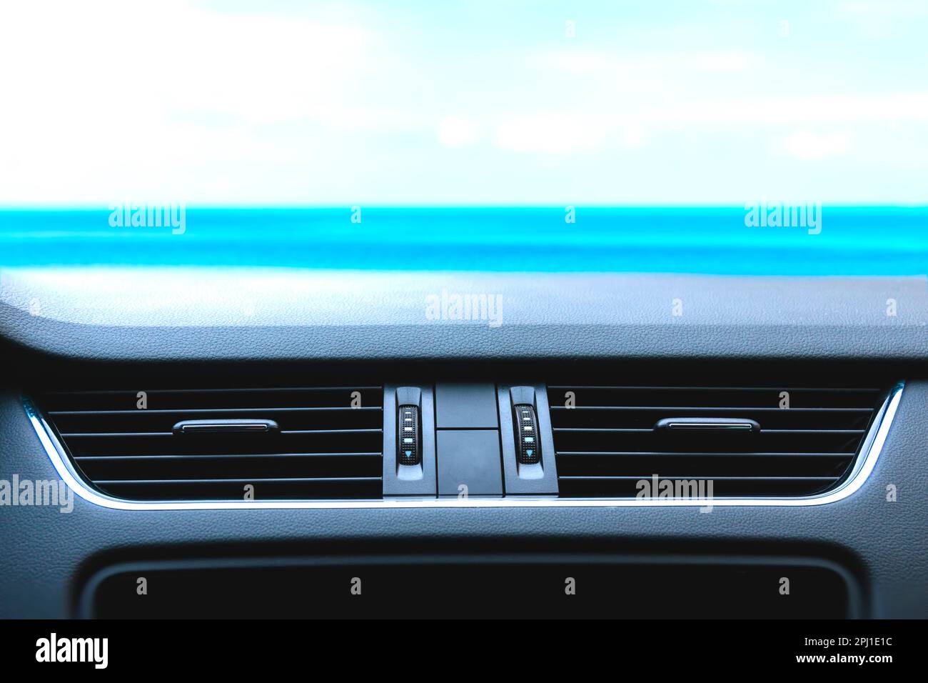Modern car air vent front look against blue sky. Template for ...