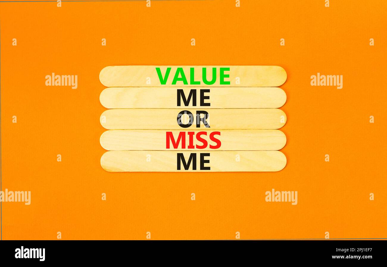 Value or miss me symbol. Concept words Value me or miss me on wooden ...