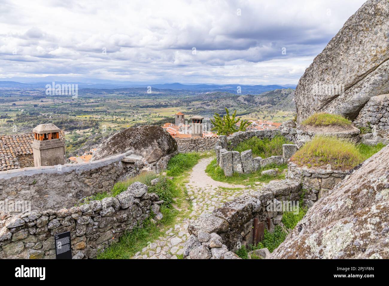 Europe, Portugal, Monsanto. Pathway with stone walls winding through ...