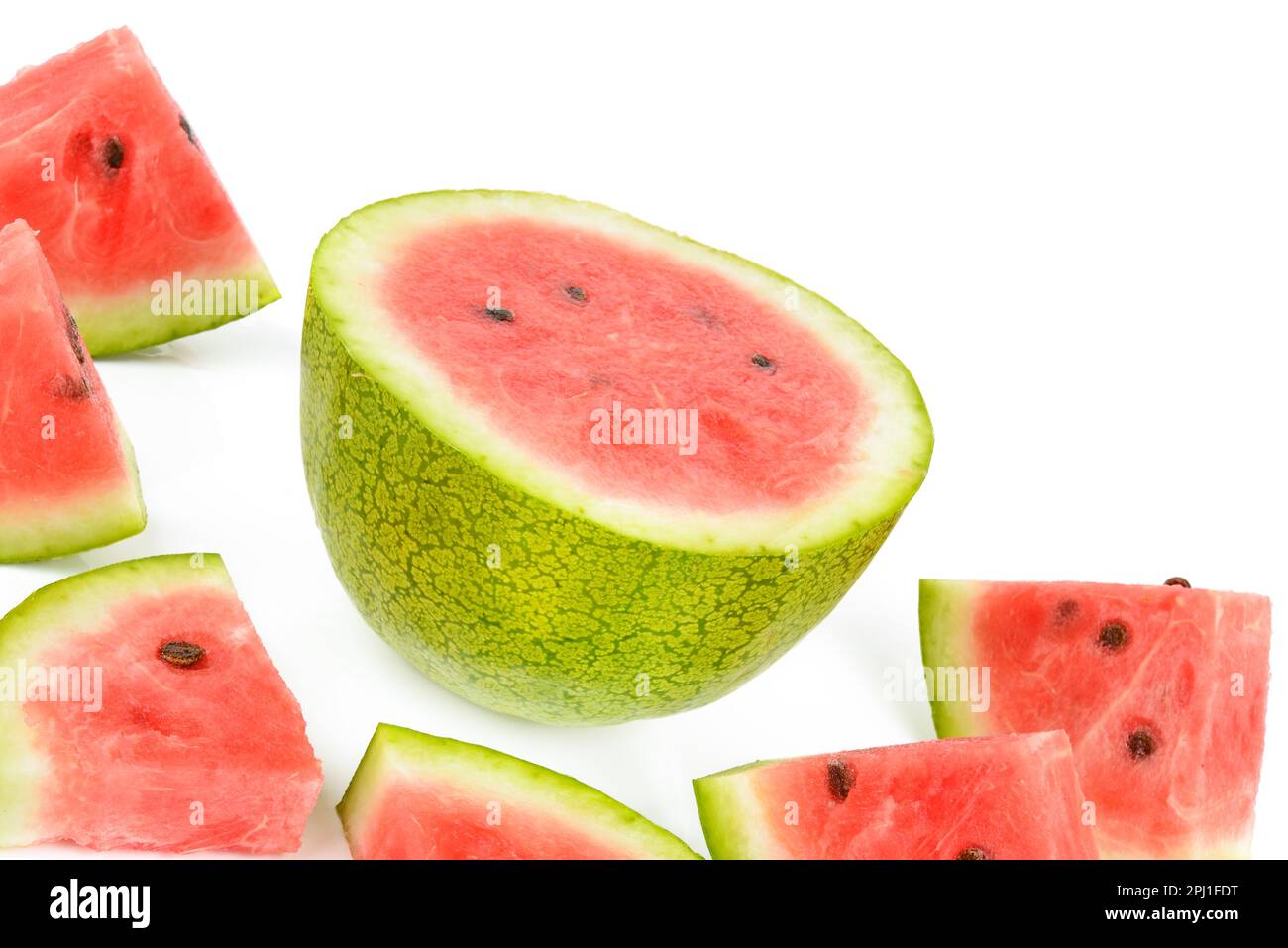 Ripe round watermelon and watermelons slices isolated on white ...