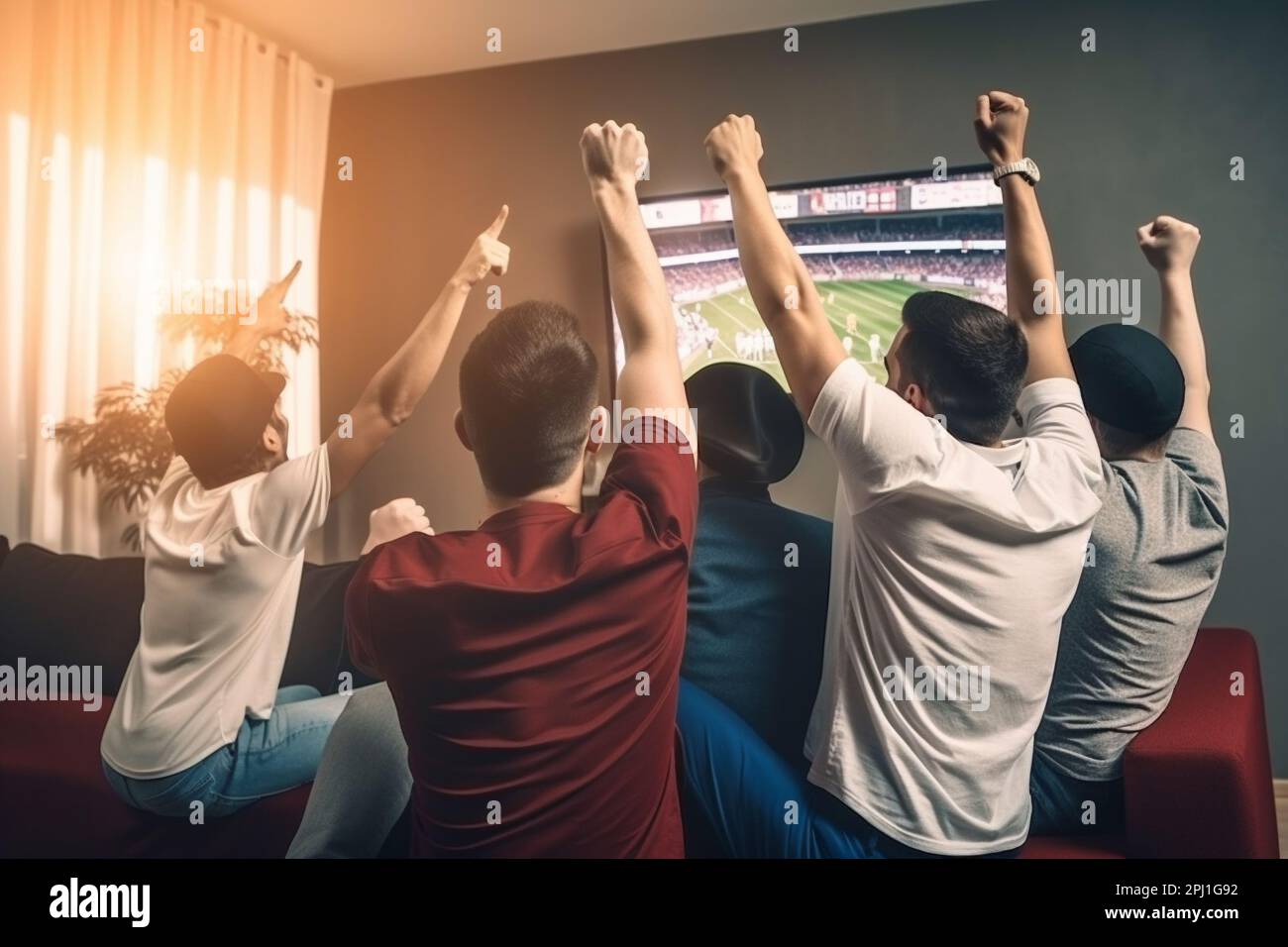 Group of fans are watching a soccer moment on the TV and celebrating a ...