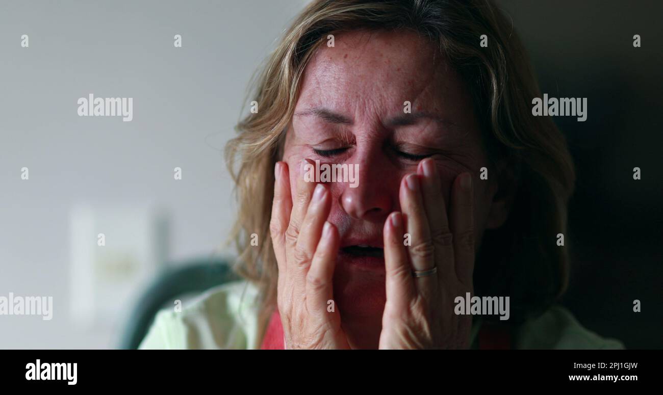 Worried older woman portrait feeling anxiety. Senior woman in 60s ...