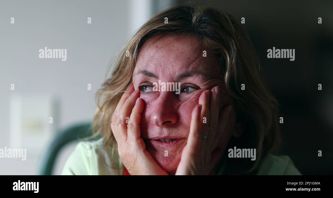 Worried older woman portrait feeling anxiety. Senior woman in 60s ...