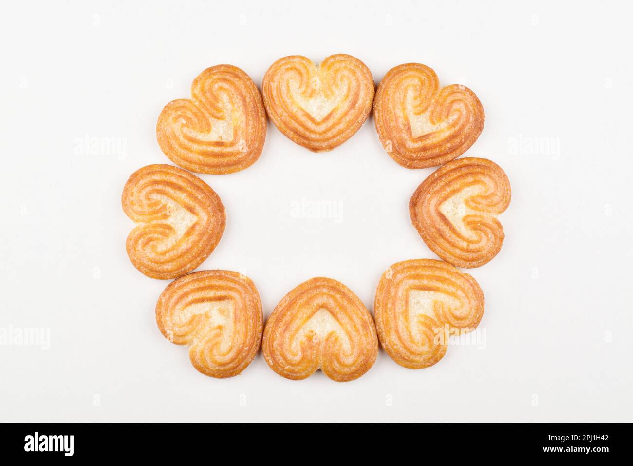 Top view of heart shaped biscuit on white background Stock Photo - Alamy