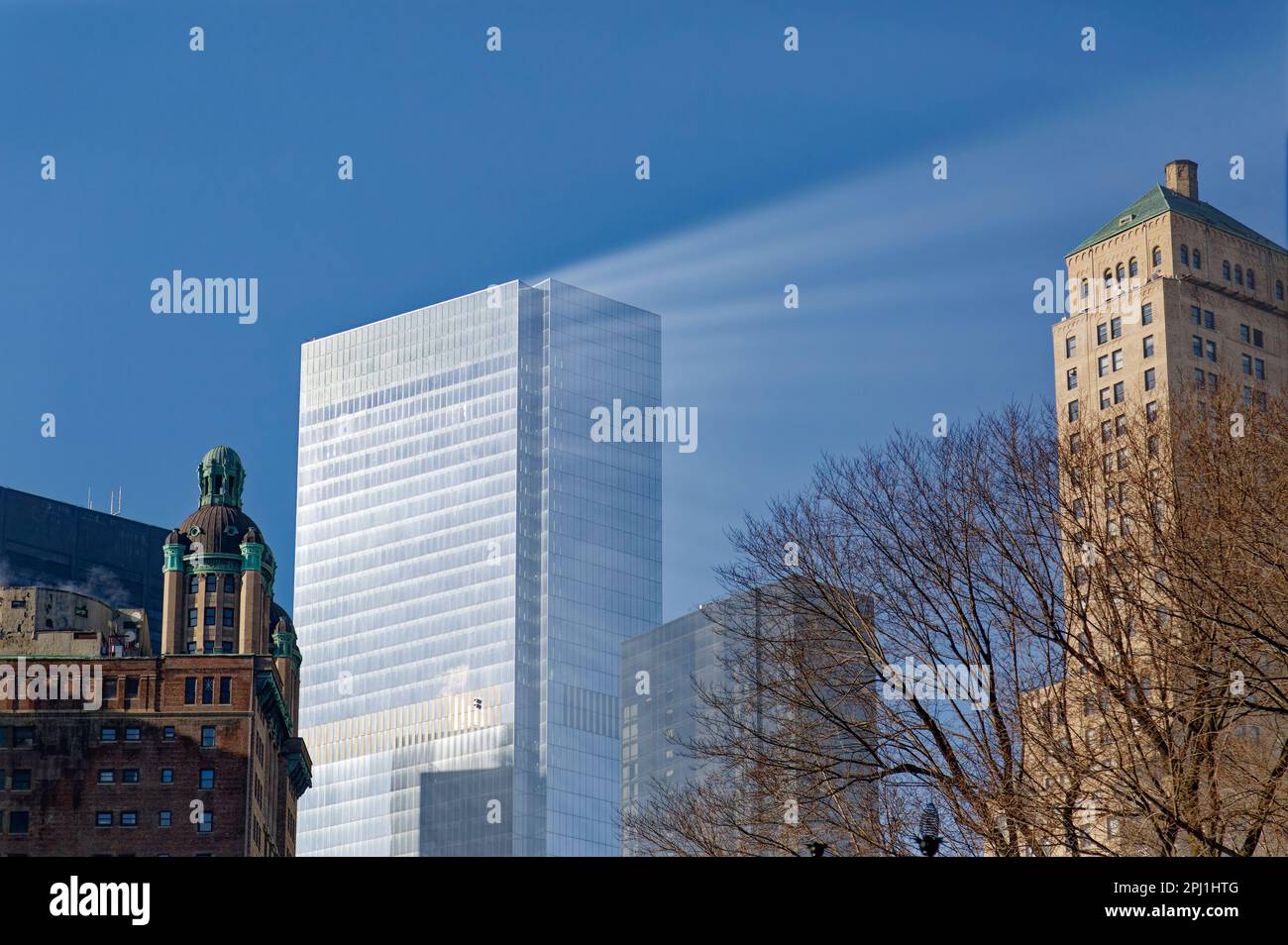 4 World Trade Center contrail forms as moisture-laden air rapidly cools ...