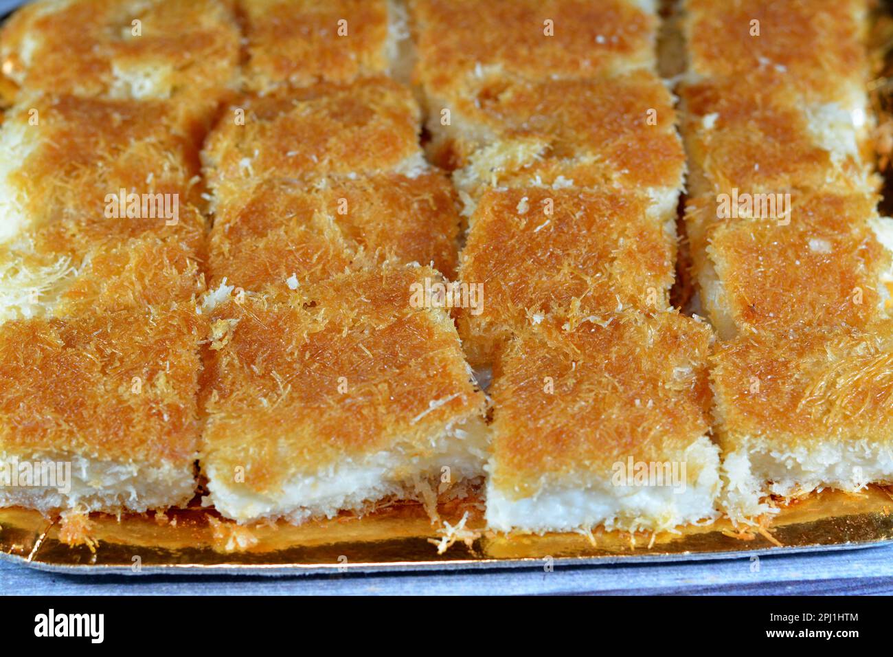 A traditional middle eastern dessert Knafeh Konafa made with spun ...