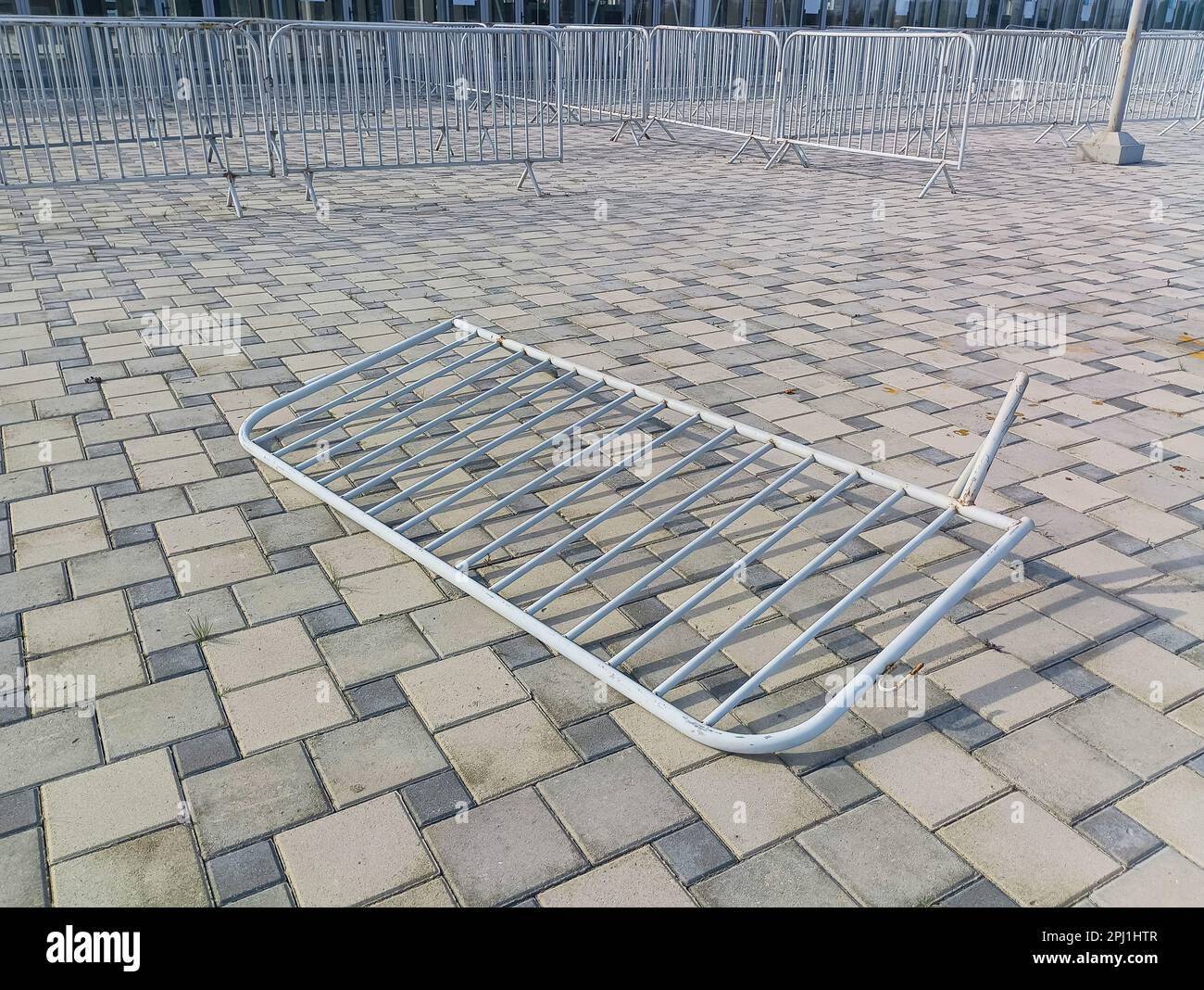 Football fans and protesting youth smashed barriers during the ...