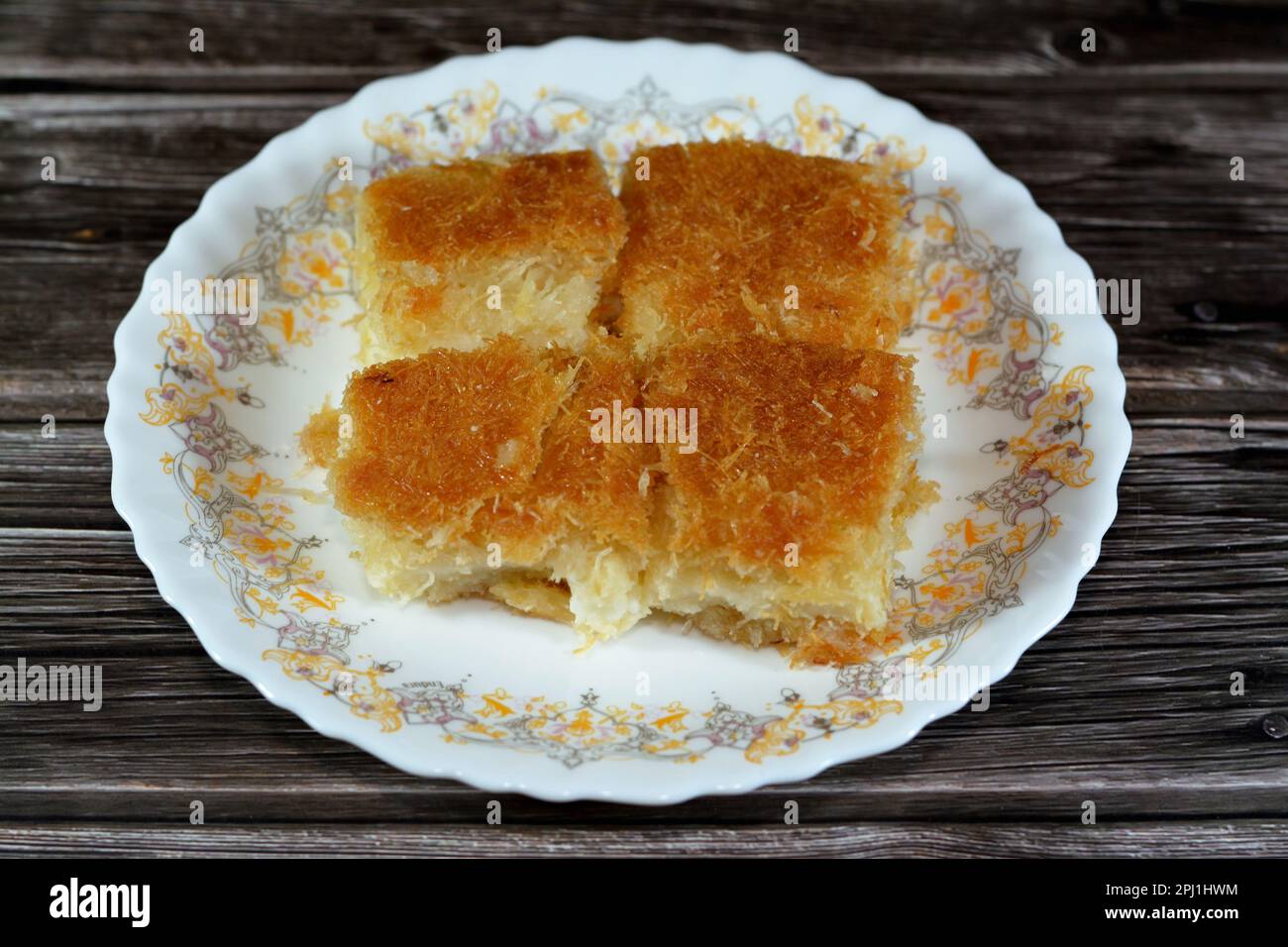 A traditional middle eastern dessert Knafeh Konafa made with spun ...