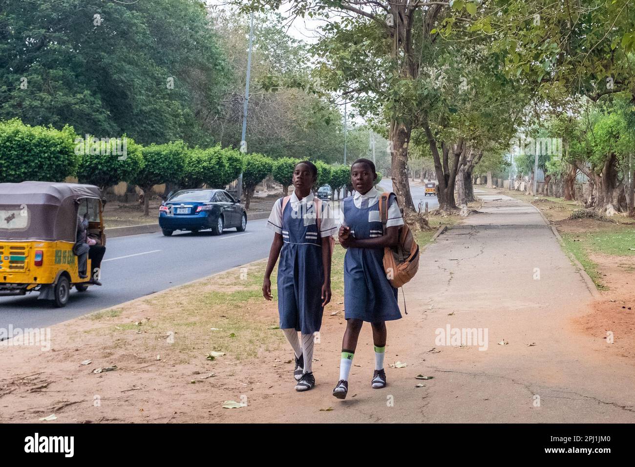 School Girls Walk To School From The National Legislative Quarters In