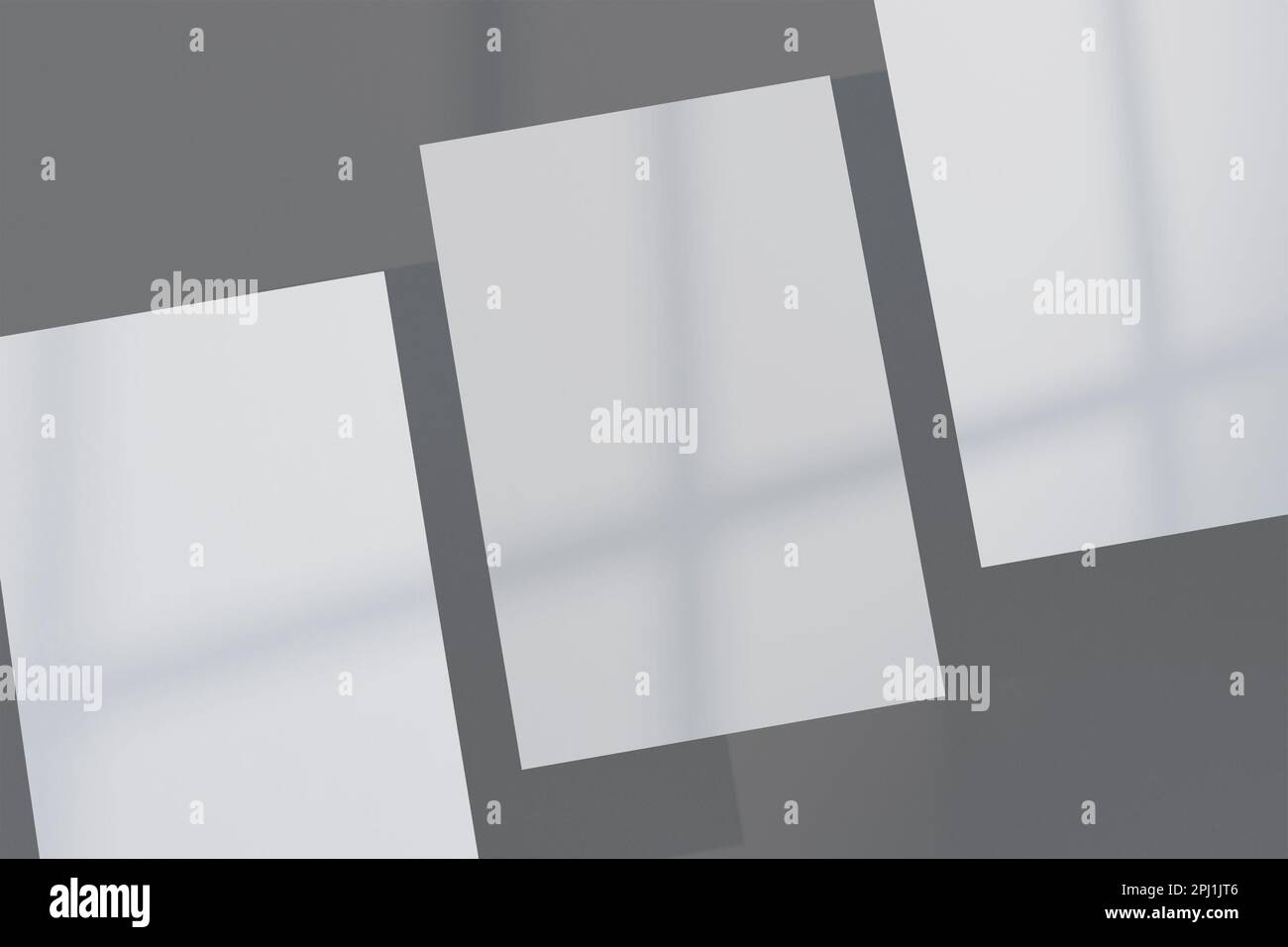 Mockup of three flyers with window shadow overlay Stock Photo - Alamy
