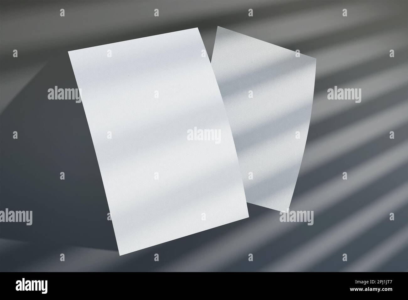 Mockup of two flyers with striped shadow overlay Stock Photo - Alamy