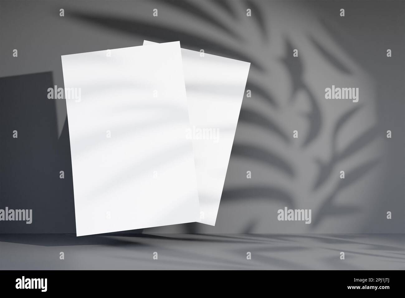 Mockup of two flyers with leaf shadow overlay Stock Photo - Alamy