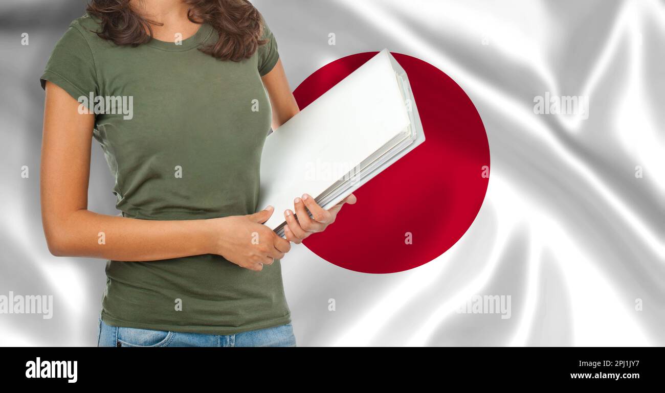 Half-length portrait of a female student with a folder. Foreign ...