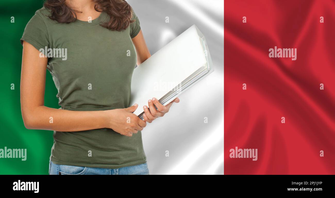 Half-length portrait of a female student with a folder. Foreign ...