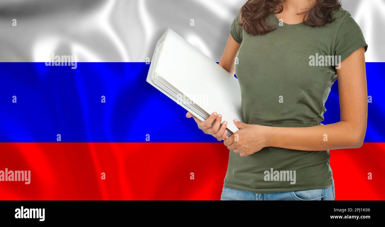 Half-length portrait of a female student with a folder. Foreign ...