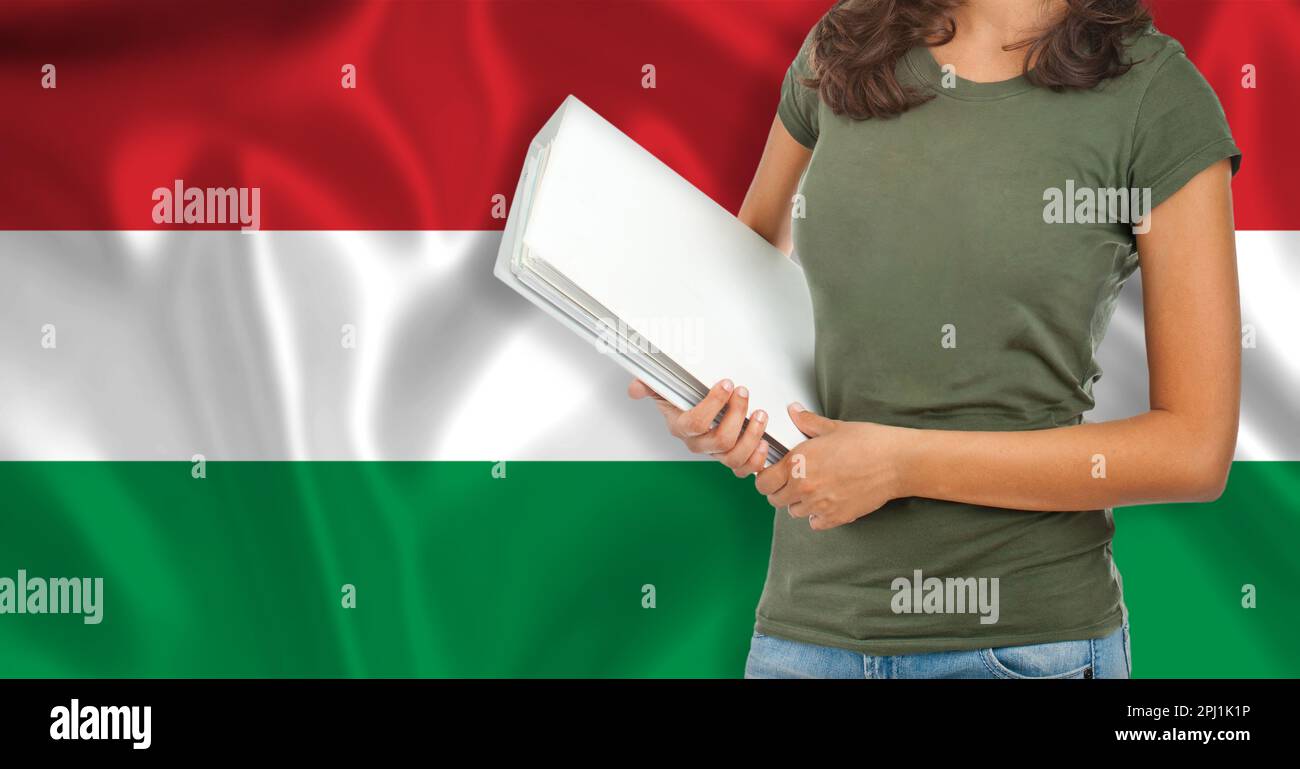 Half-length portrait of a female student with a folder. Foreign ...