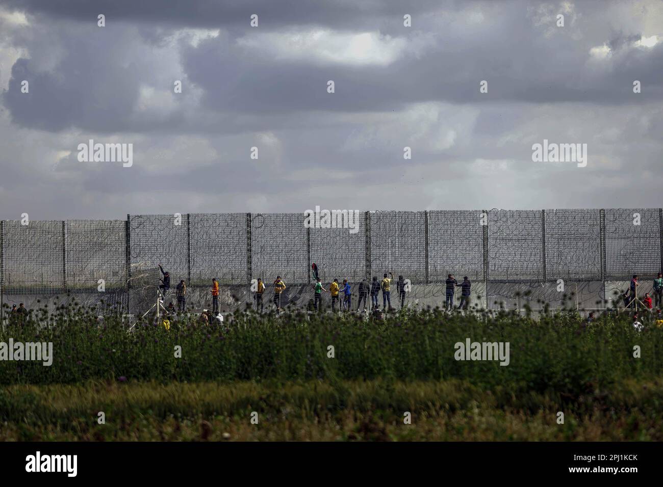Gaza, Palestine. 30th Mar, 2023. Palestinian protesters attempt to ...