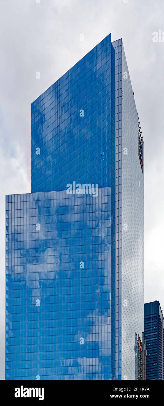4 World Trade Center, with its highly reflective glass curtain wall ...