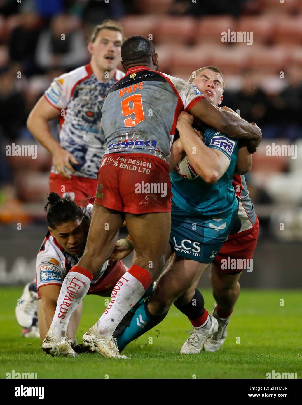 Wigan Warriors' Morgan Smithies (right) is tackled by Leigh Leopards ...