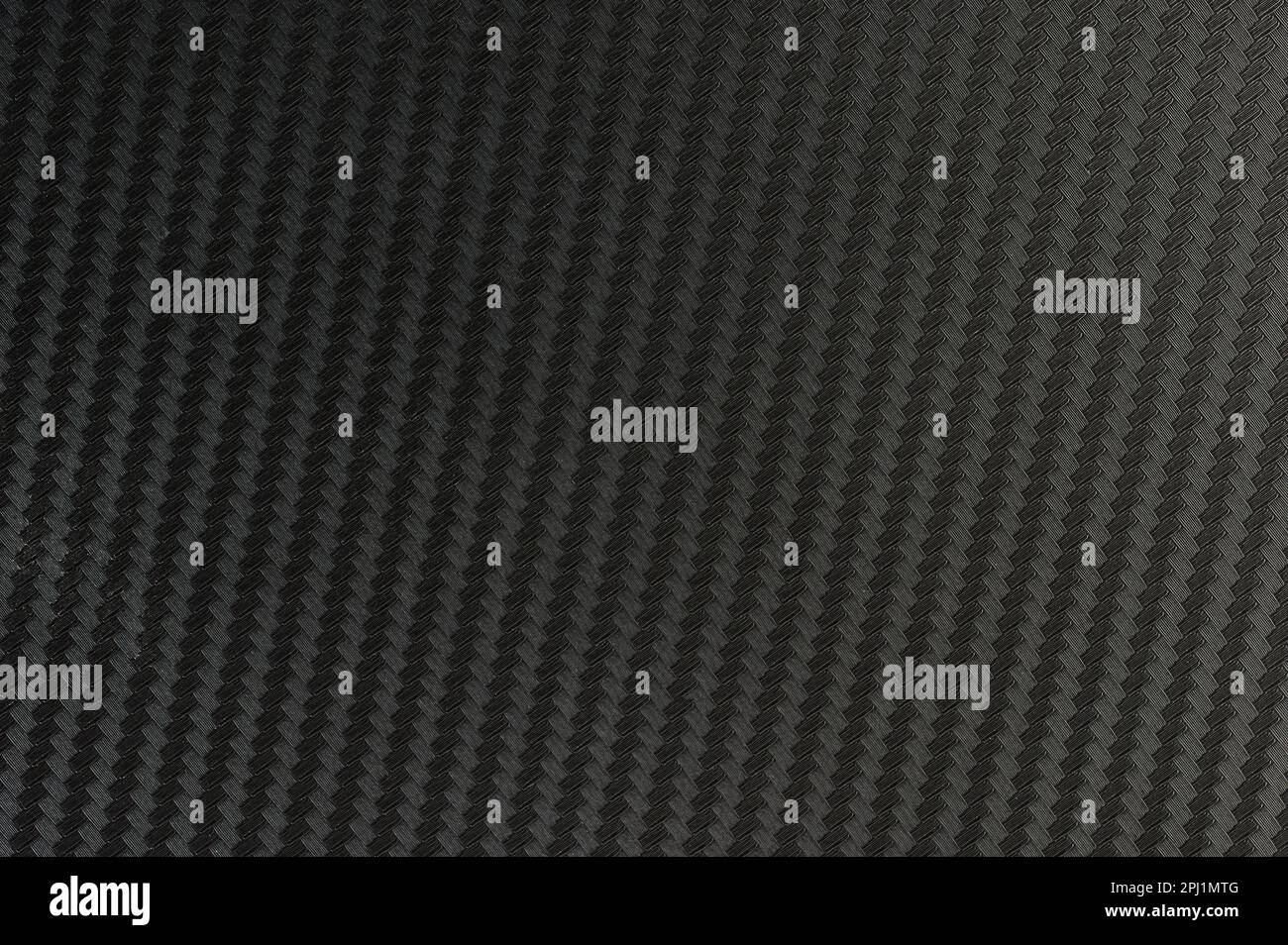 Carbon fiber lines pattern flat background close up view Stock Photo ...