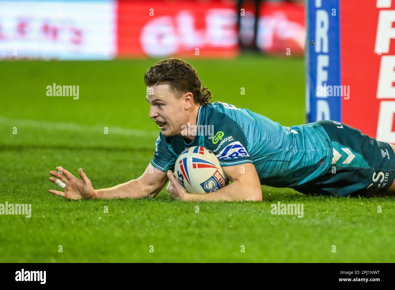 Jai Field #1 of Wigan Warriors goes over for a try during the Betfred ...