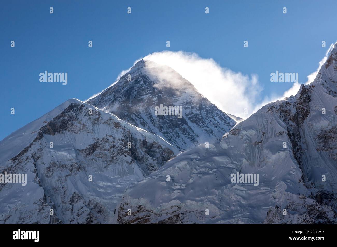 Mount Everest Peak (Sagarmatha, Chomolungma) - the top of the world (8848 m). Sunrise over the ...