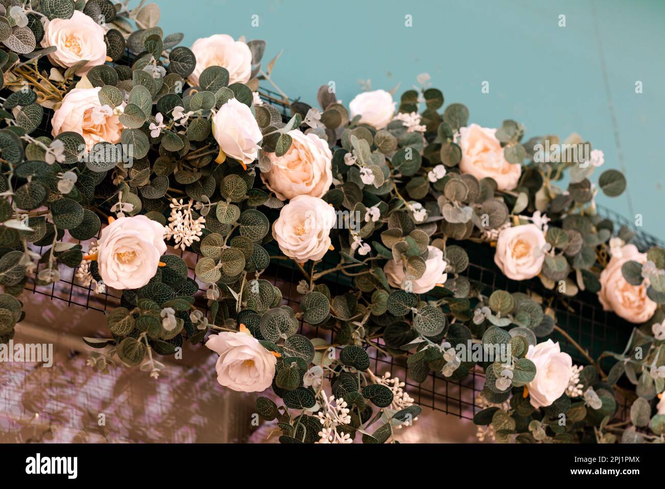A stunning floral hanging display featuring white roses Stock Photo - Alamy