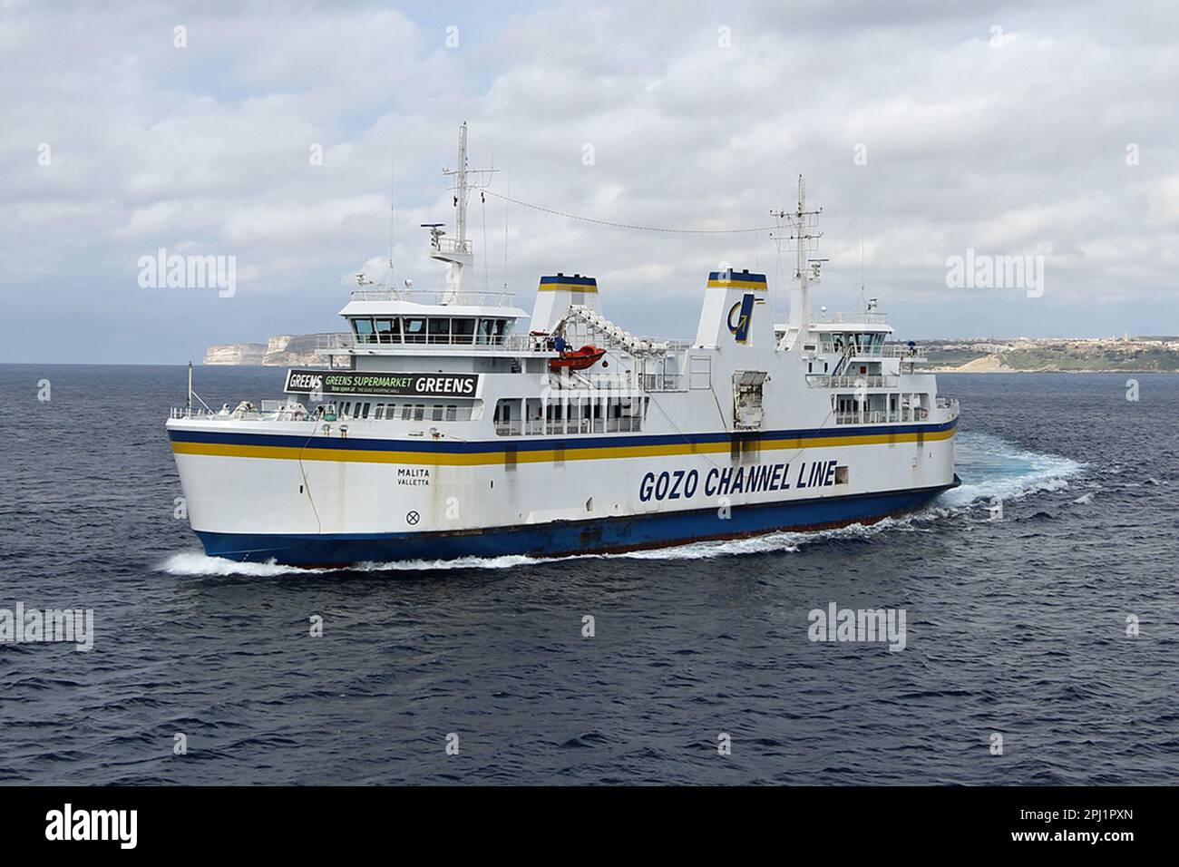 A ferry crossing the Gozo Channel, which is short stretch of ...