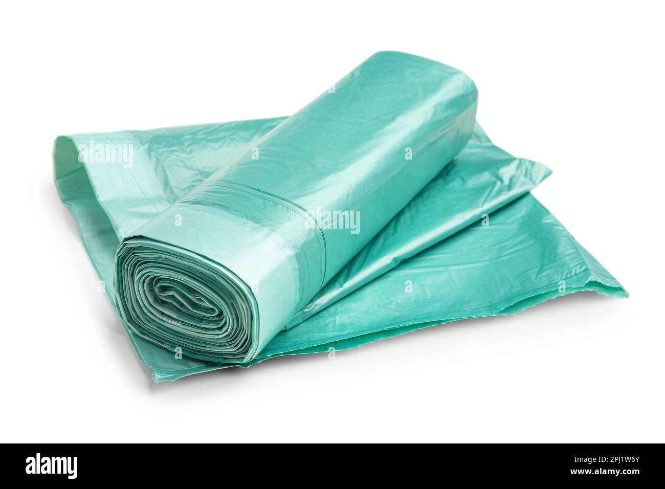 Green roll of garbage bags isolated on white background Stock Photo - Alamy