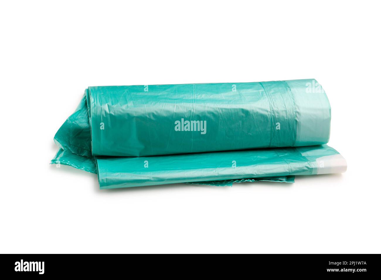 Green roll of garbage bags isolated on white background Stock Photo - Alamy