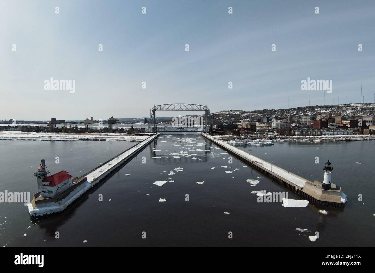 Aerial lift bridge and lighthouses on Lake Superior in Duluth Stock ...