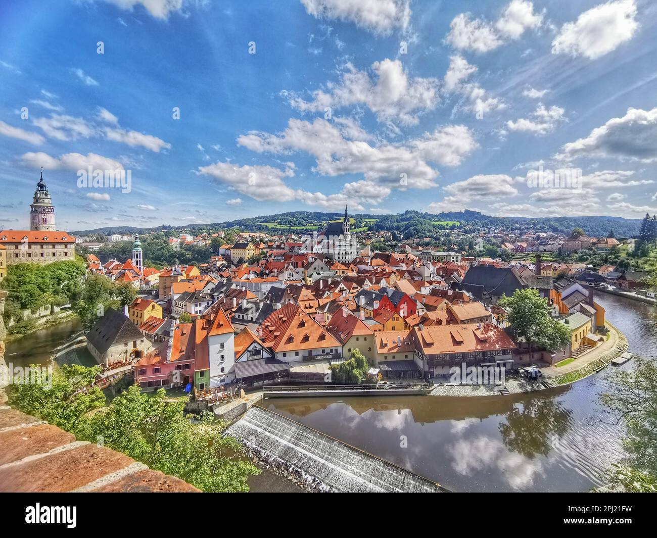 Aerial view of a city skyline featuring a river with water flowing ...