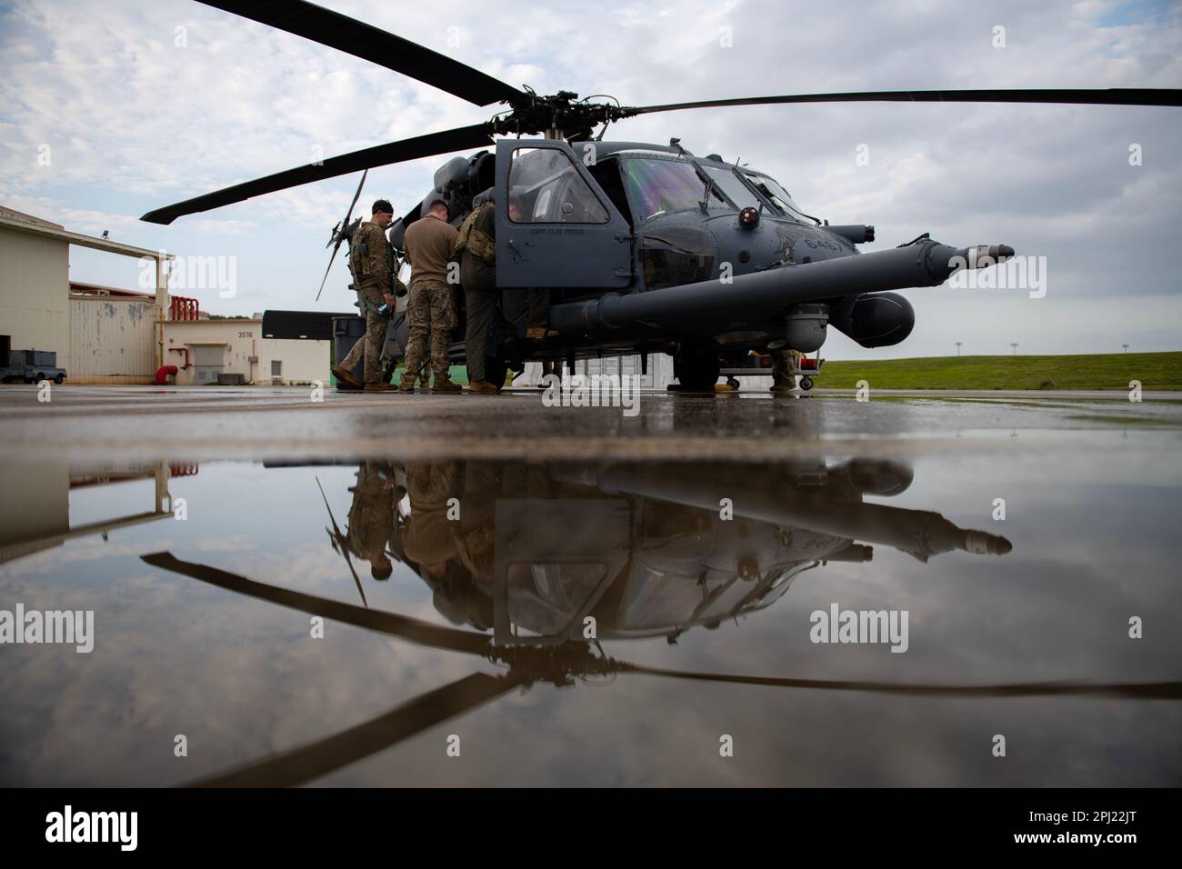 U.S. Air Force aircrew assigned to the 33rd Rescue Squadron prepare an ...