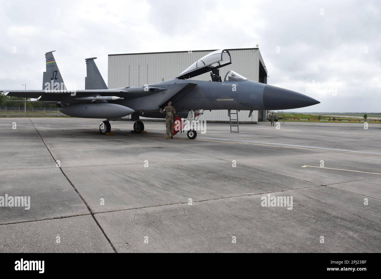 A maintainer prepares a NORAD aircraft to take off from Naval Air ...