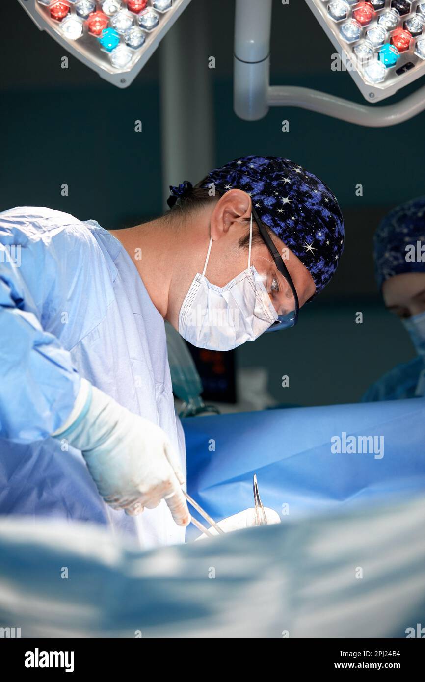 Modern equipment in operating room. Team surgeon at work in operating ...