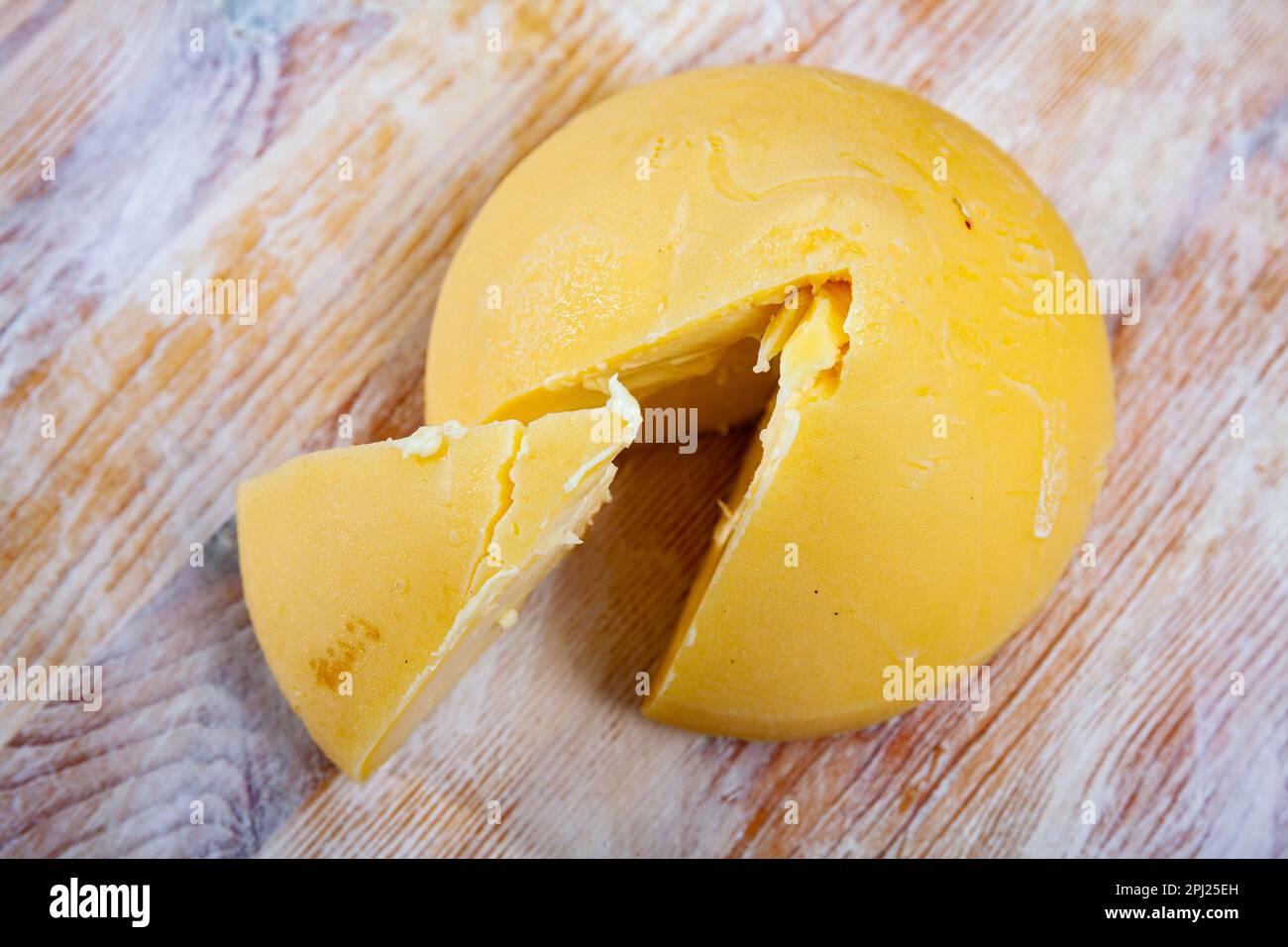Galician semi-hard cheese Tetilla Stock Photo - Alamy