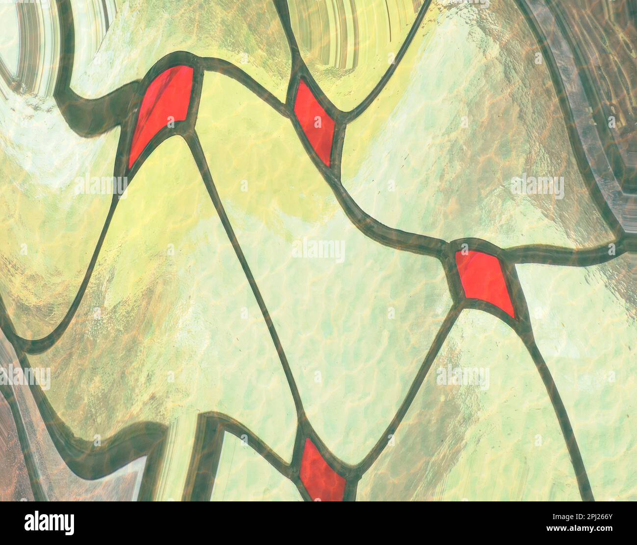 Closeup view shows old window pane with whimsical designs & black lines ...