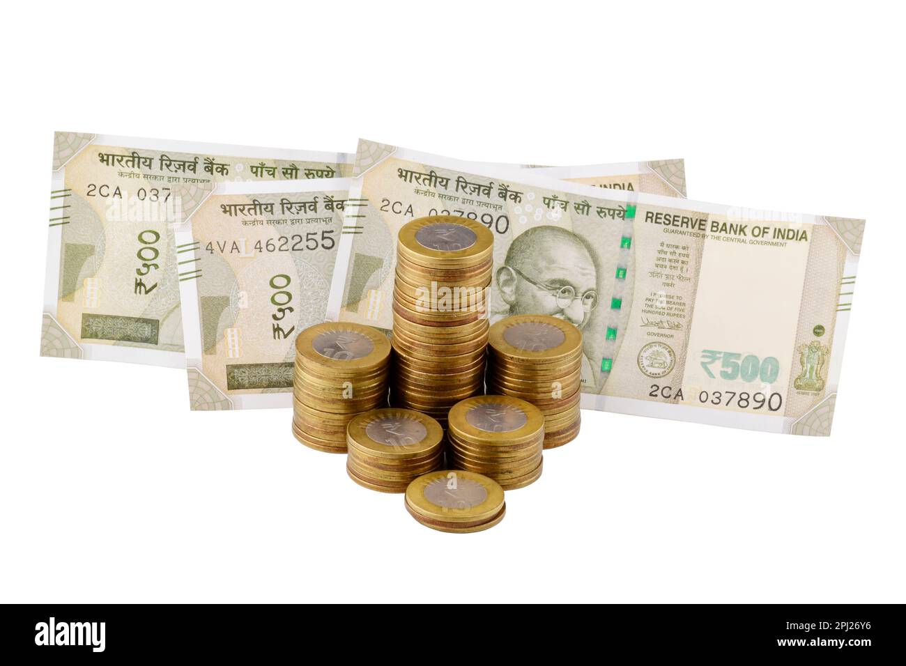 500 rupees note with coins pile isolated on white background with ...