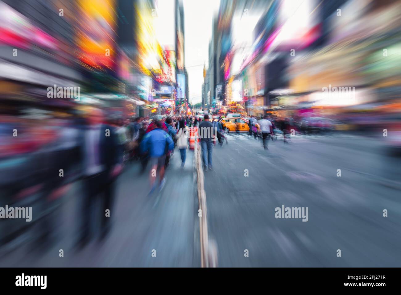 street scene at dusk in New York City with camera made zoom effect ...