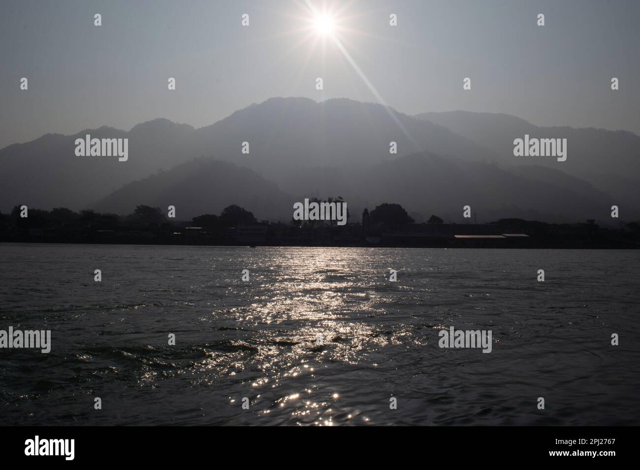 Sunlight reflection on the river Stock Photo - Alamy